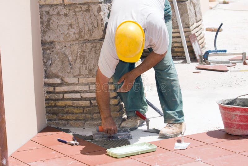 Bricklayer at work stock image. Image of adult, laying - 5464257