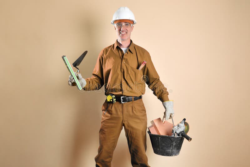 Bricklayer in Work Clothes Holding Tools and Building Materials Stock ...