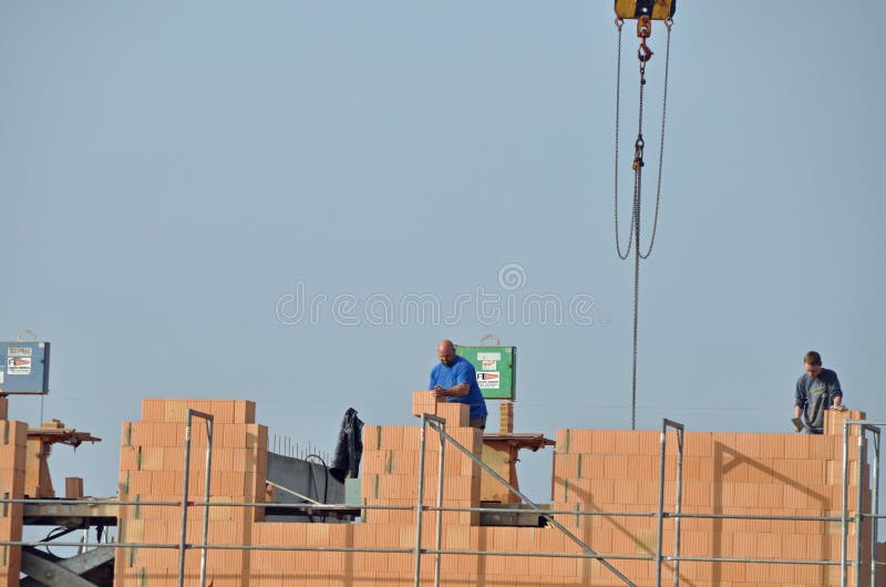 Bricklayer at work stock photo. Image of cement, construction - 5464780