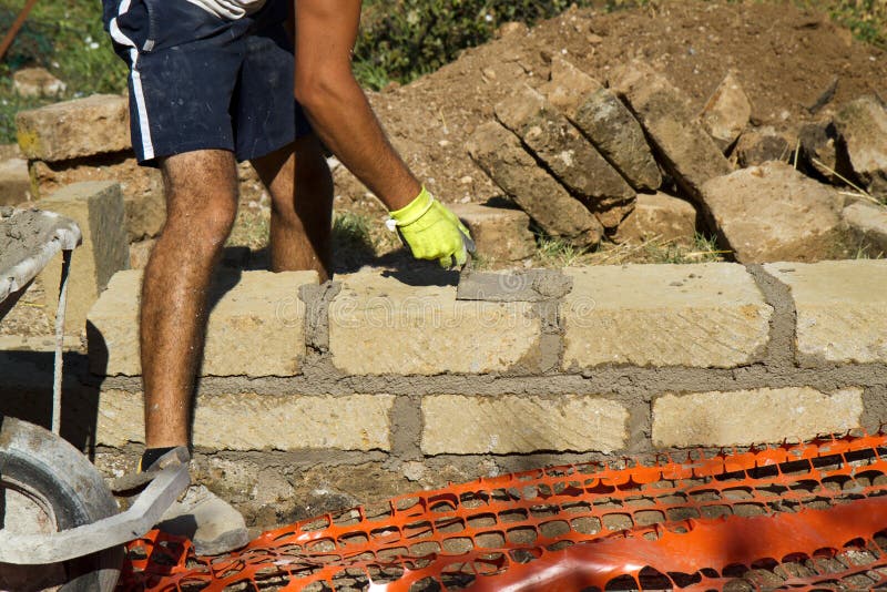 Bricklayer at Work in a Site Stock Photo - Image of concrete, bricks ...