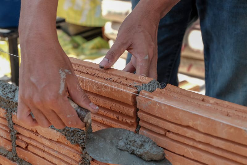 Bricklayer Worker Installing Brick Masonry Stock Image - Image of ...