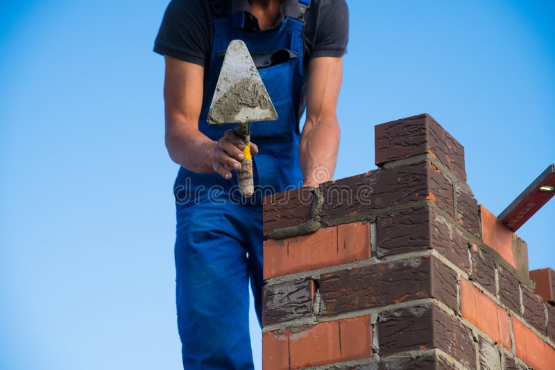 Bricklayer Worker Installing Brick Masonry on Exterior Wall Stock Image ...
