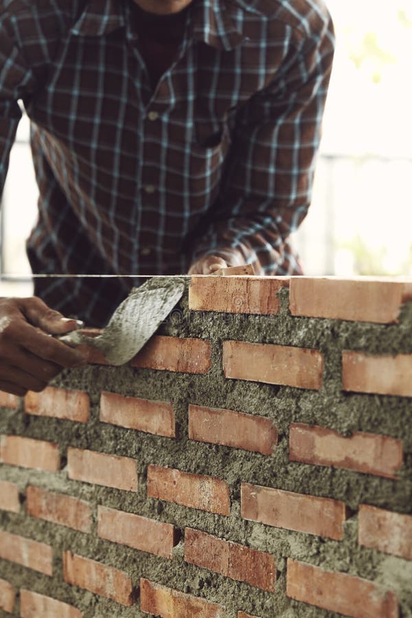 Bricklayer Worker Installing Brick Masonry Stock Photo - Image of ...