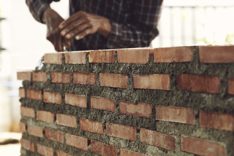 Bricklayer Worker Installing Brick Masonry Stock Photo - Image of ...