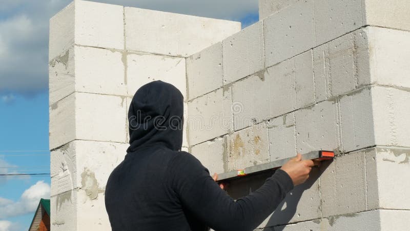 Bricklayer Worker Man. the Horizontal Gauge is in the Hands of the ...
