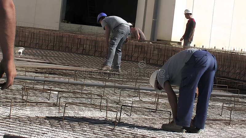 Bricklayers Putting Wire in Forged Iron Structure Stock Footage - Video ...