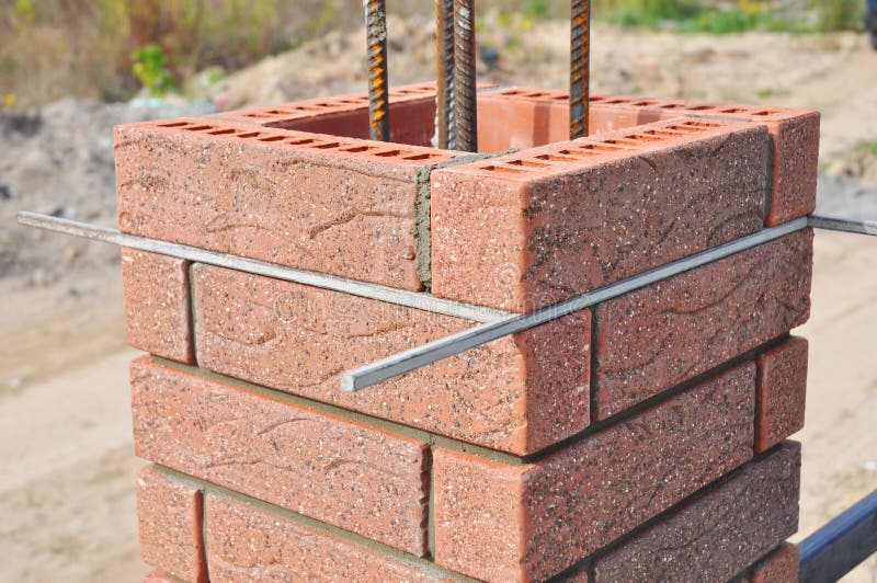 Bricklaying Column from Red Brick Blocks with Metal Rod Stock Image ...