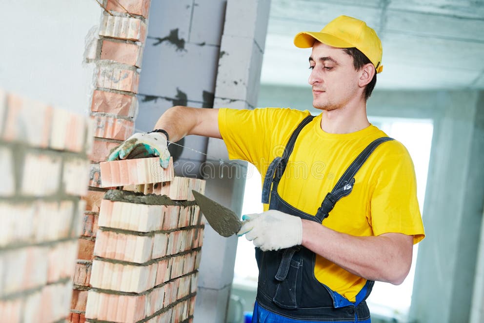 Bricklaying. Construction Worker Building a Brick Wall Stock Image ...