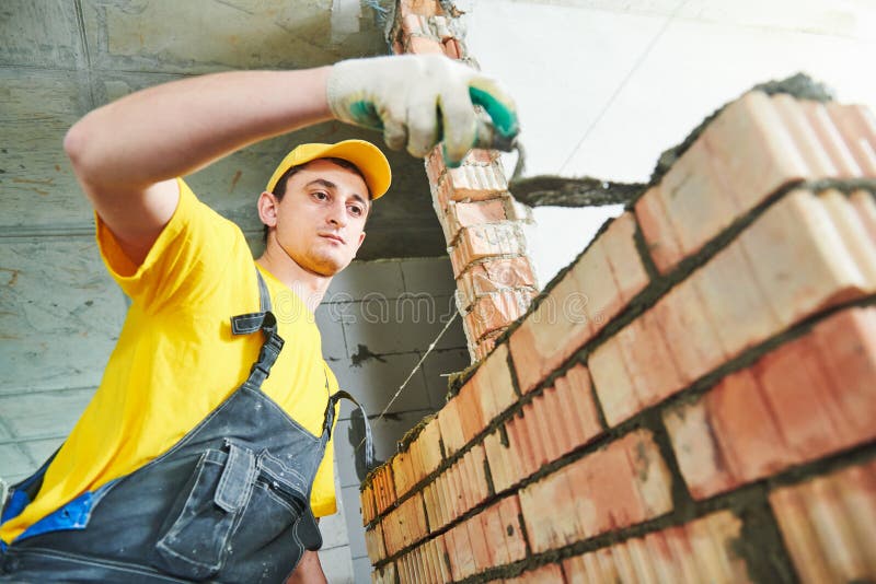 Bricklayer Builder Working with Autoclaved Aerated Concrete Blocks ...