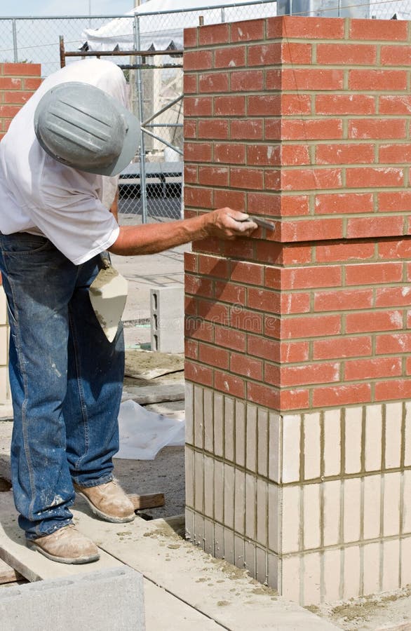 Bricklayer at work stock image. Image of adult, laying - 5464257