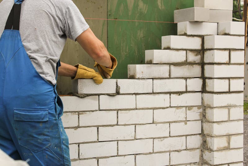 Bricklaying Under the Cord. Stock Image - Image of construction, work ...