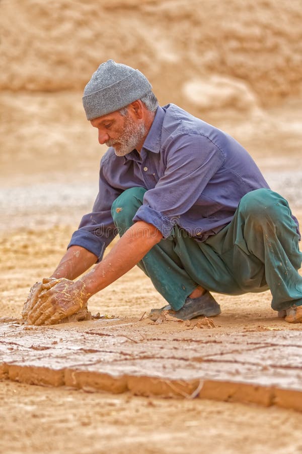 Brickman making bricks editorial photo. Image of heritage - 177141731