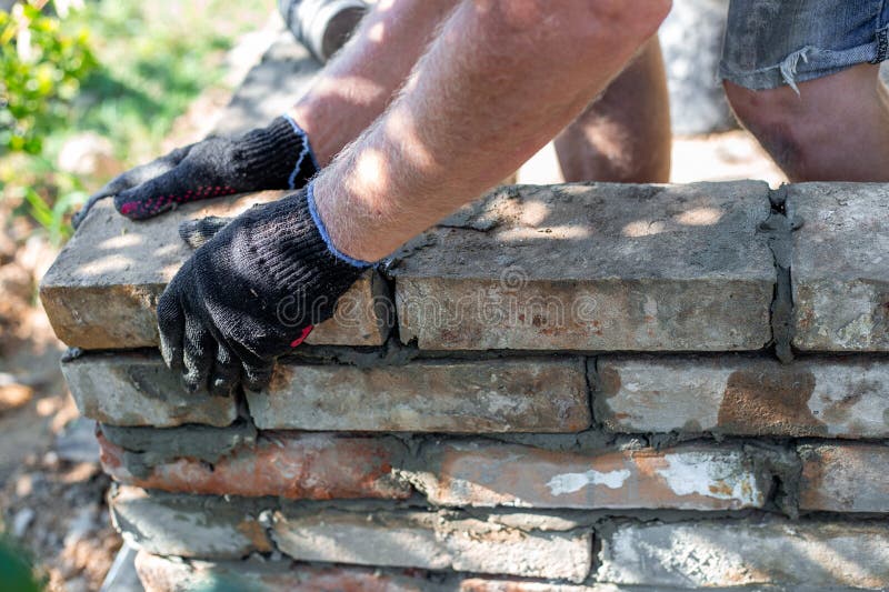 Bricks Being Laid on a Partially Built Brick Structure with Mortar ...