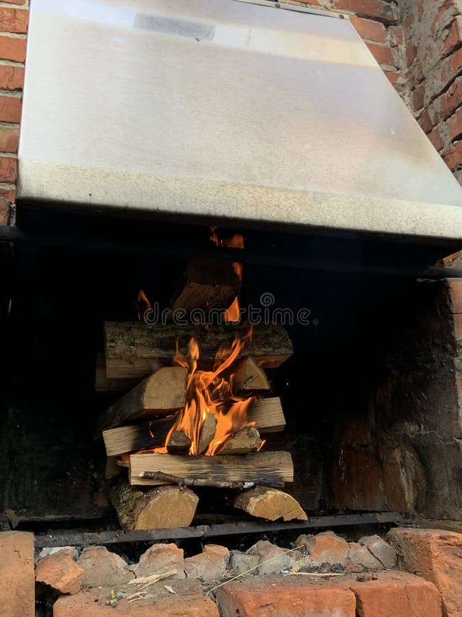 Bricks Campfire with Burning Firewood Stock Photo - Image of flame ...