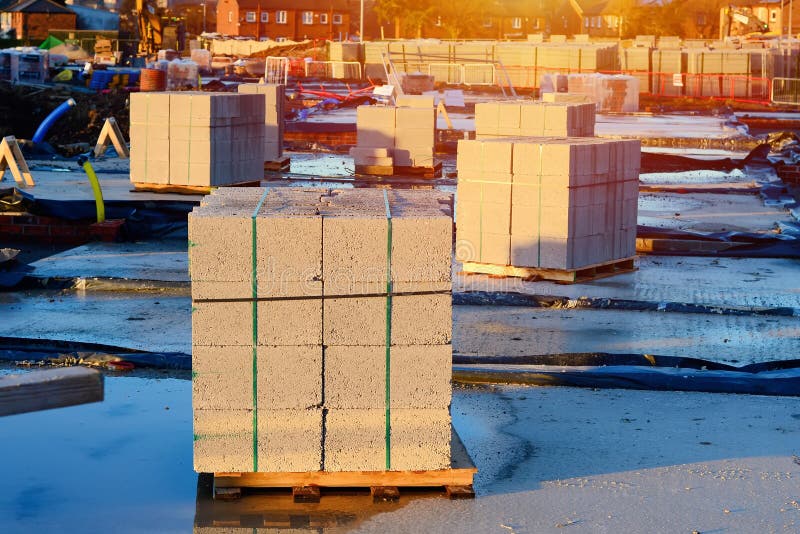 Bricks and Concrete Blocks Delivered To Construction Site and Placed ...