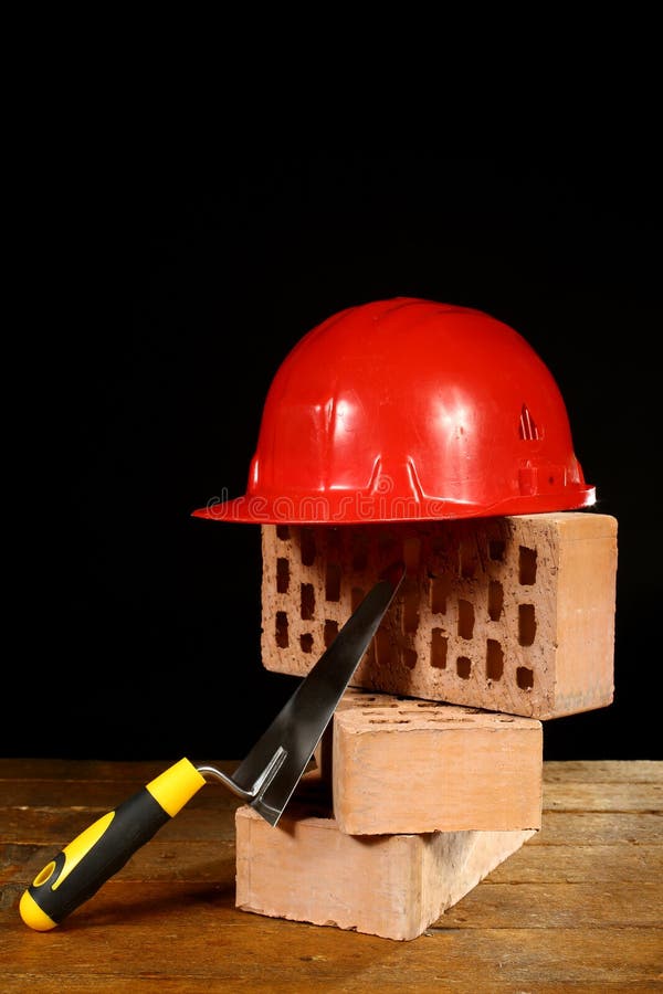 Bricks and helmet stock photo. Image of work, thinner - 96674184
