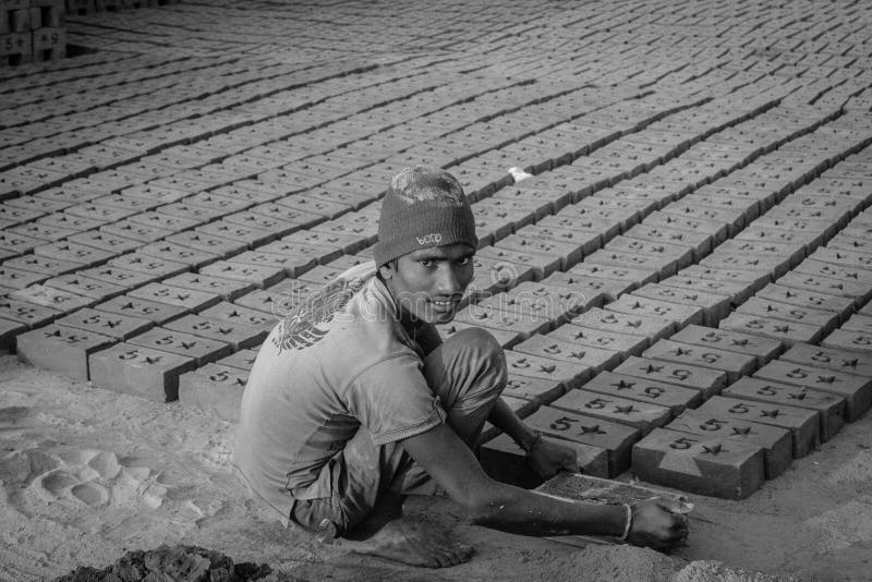 Bricks making worker editorial photography. Image of portrait - 48613312