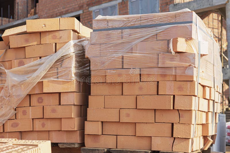 Bricks in Pallets on a Construction Site. Construction Materials Stock ...