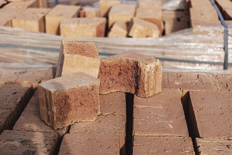 Bricks in Pallets on a Construction Site. Construction Materials Stock ...