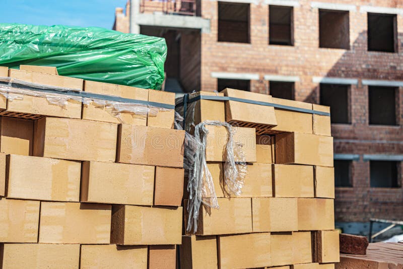 Bricks in Pallets on a Construction Site. Construction Materials Stock ...