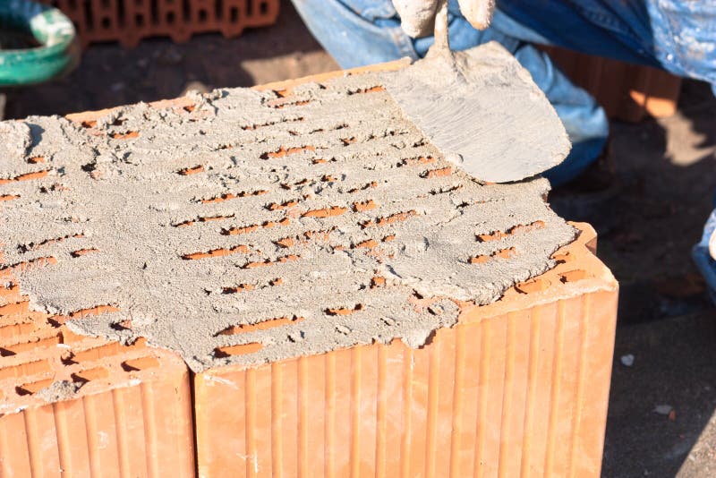 Bricks and plaster stock image. Image of work, build - 21322493