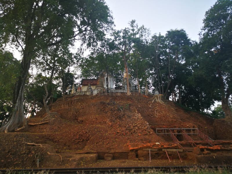 Bricks and Ruins of an Ancient Hilltop Covered with Trees and Religious ...