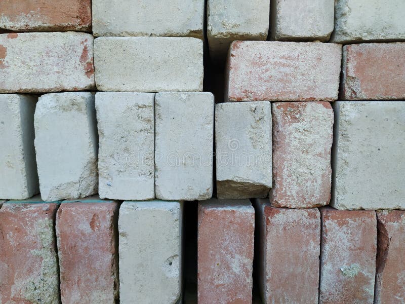 Bricks stacked in piles. stock image. Image of stonewall - 276581501