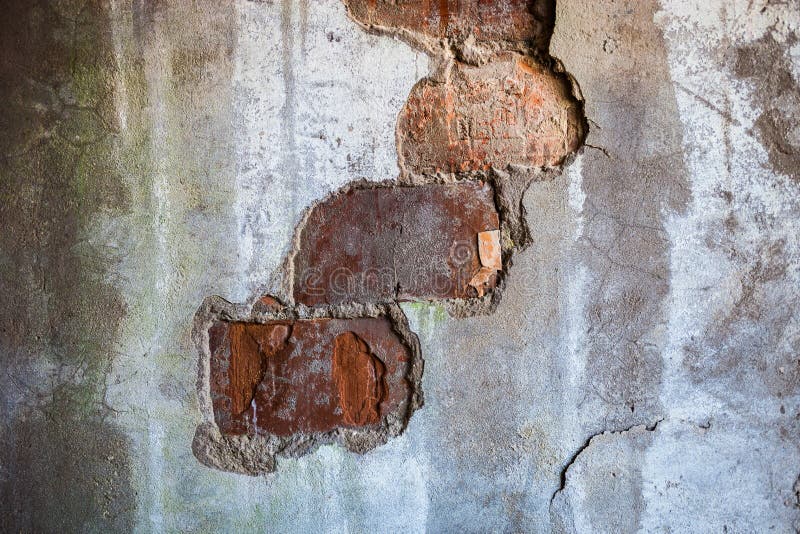 Bricks Visible in the Split Plaster of the Old Wall Stock Image - Image ...