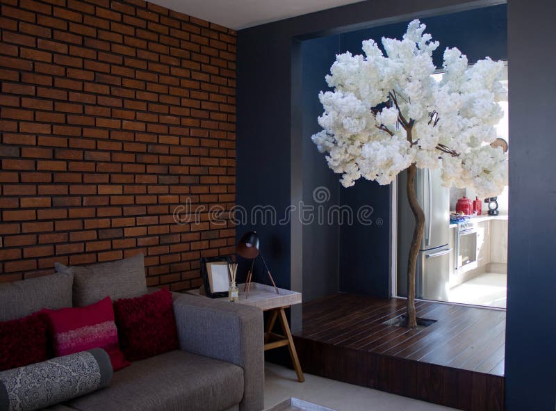 Brickwall Livingroom with a Tree in the Middle Stock Photo - Image of ...