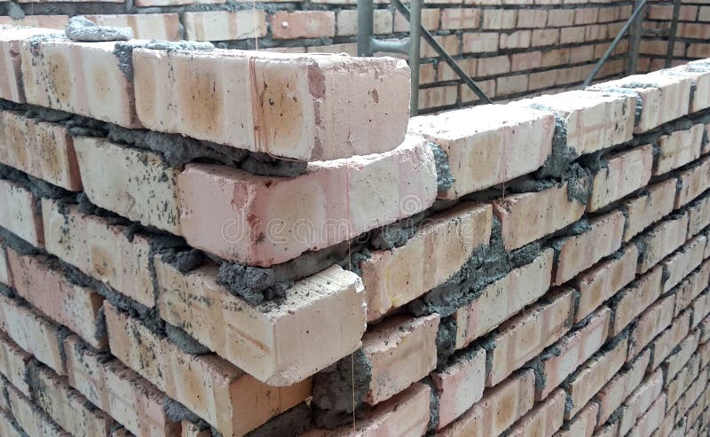 Brickwork by Construction Workers at the Construction Site. Stock Photo ...