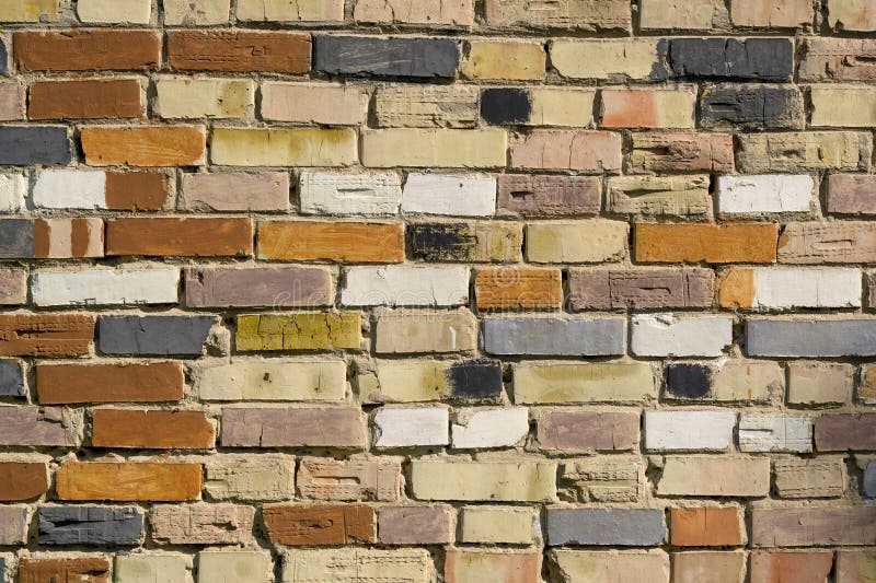 Brickwork of a Wall of Multi-colored Bricks Stock Image - Image of ...