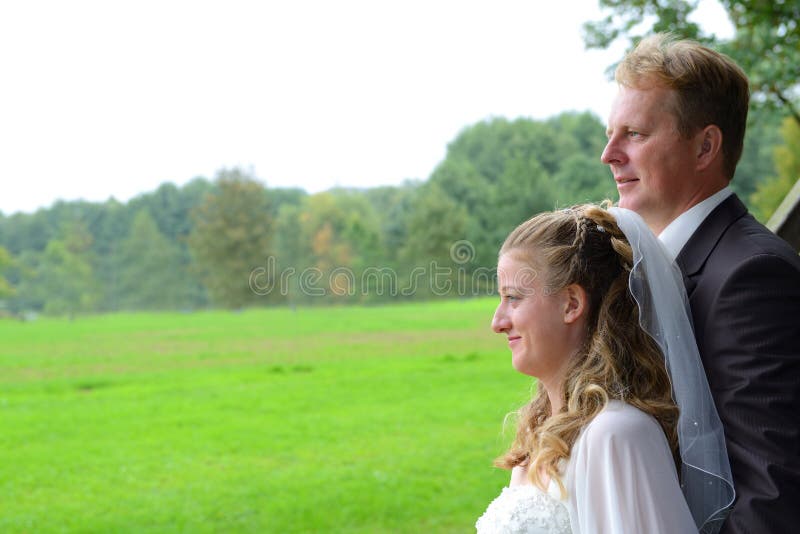 Bridal Couple in Front of Nature Background Stock Image - Image of love ...