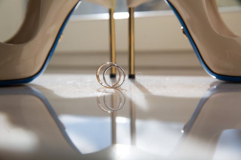 Bridal Elegance: White Heels and Wedding Ring Reflection Stock Image ...