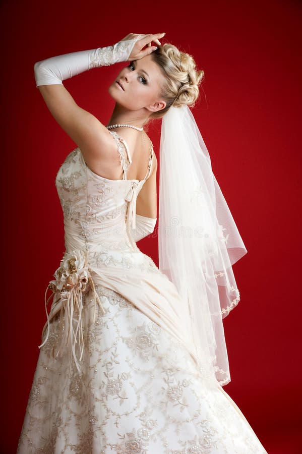 Beautiful Bride Posing Dramatic in the Studio Stock Photo - Image of ...