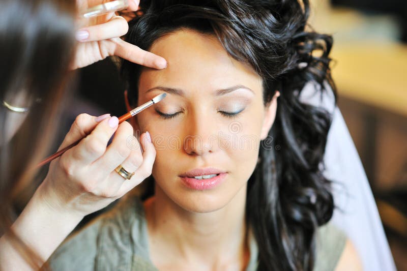 Bride Applying Wedding Make-up by Make-up Artist Stock Image - Image of ...