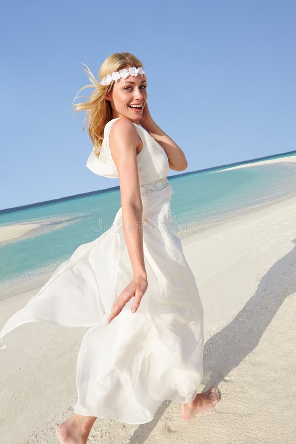 Bride at Beautiful Beach Wedding Stock Photo - Image of beautiful ...