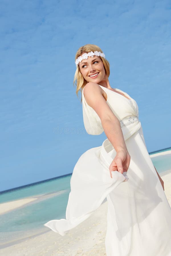 Bride at Beautiful Beach Wedding Stock Photo - Image of women, bride ...