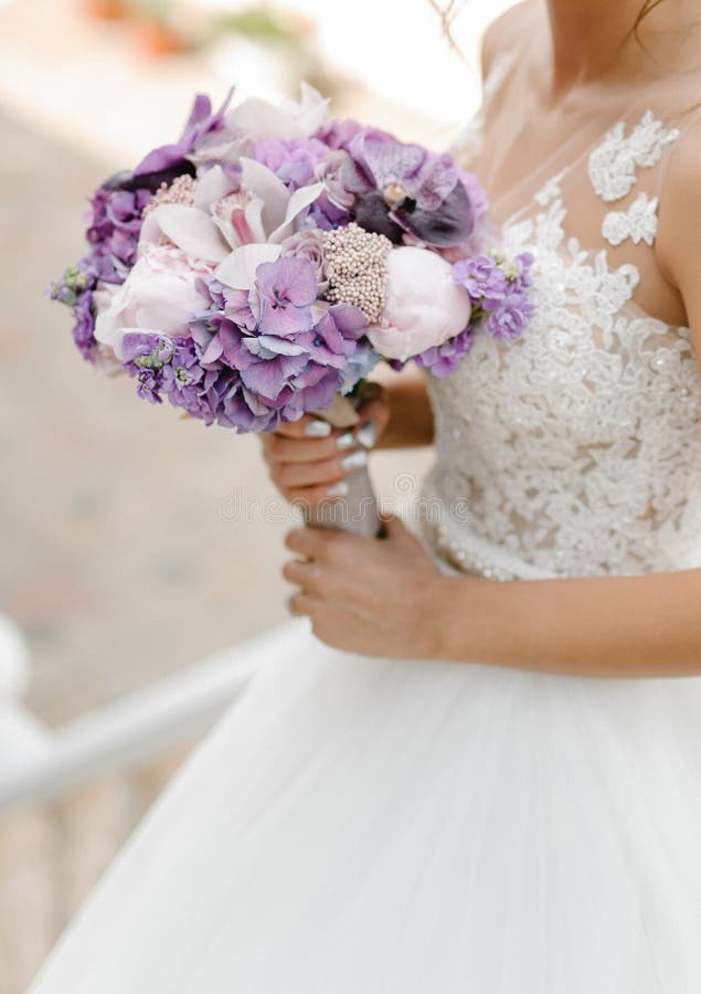 Bride with a Beautiful Purple Wedding Bouquet Stock Image - Image of ...