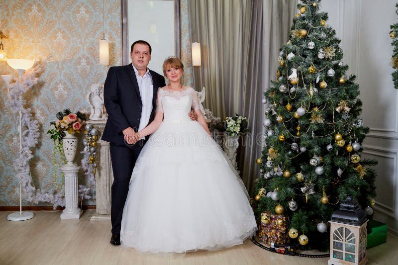 Bride and Big Fat Groom in a Nice Room Stock Photo - Image of happy ...