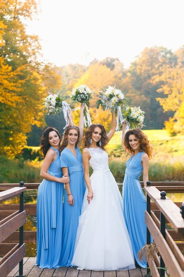 Bride with bridesmaids stock photo. Image of friends - 78517584