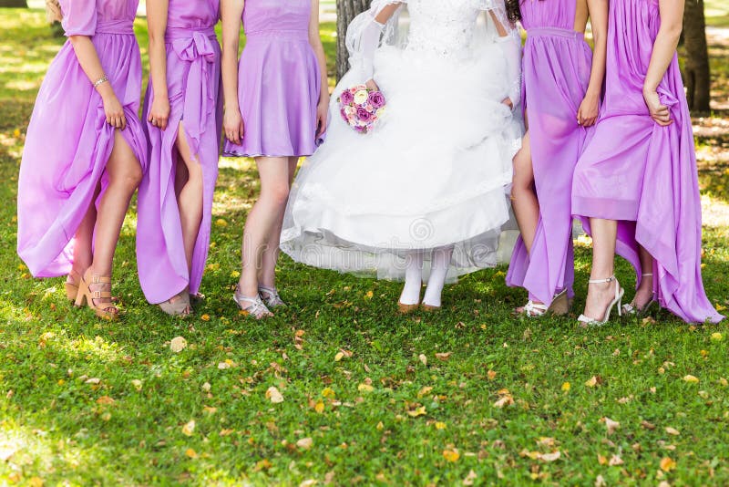 Bride and Bridesmaids Show Off Their Shoes at Wedding. Stock Photo ...