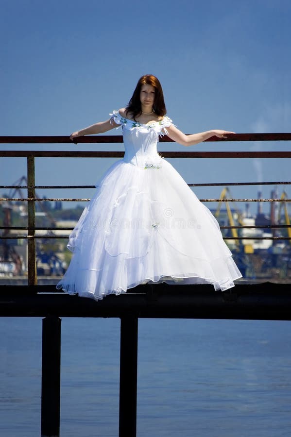 Bride on a bridge stock photo. Image of hairdress, clothes - 5338632