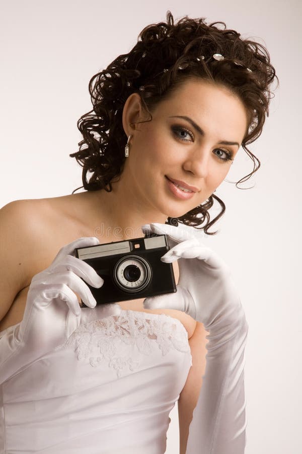 Bride with camera stock photo. Image of makeup, caucasian - 27988920
