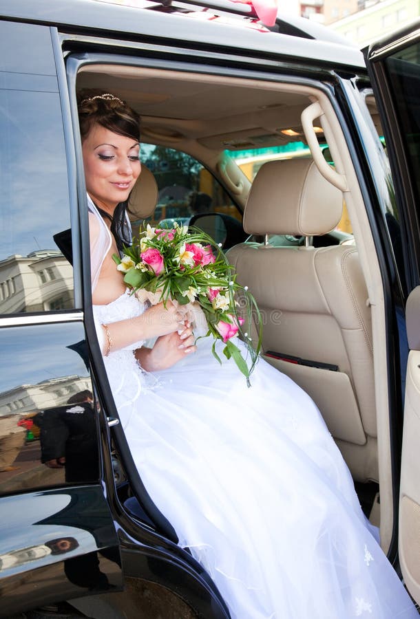 Bride Exiting Wedding Car Limo Stock Image - Image of limousine, love ...