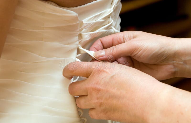 Bride dress help stock photo. Image of nice, clothing - 27698152