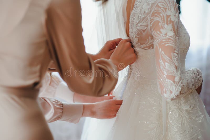Bride Dressing Wedding Gown. Morning Bride. Stock Image - Image of ...