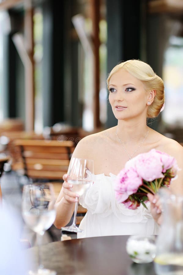 Bride drinking champagne stock image. Image of black - 21155889