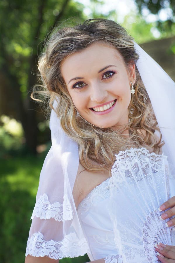 Bride with a fan. stock image. Image of holding, happy - 29193577