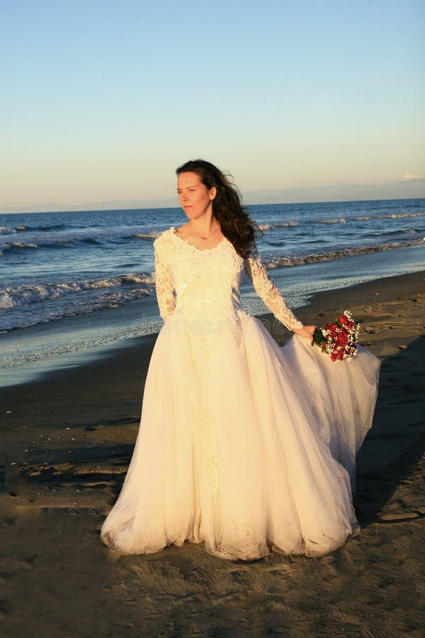Bride and flowers stock image. Image of years, beach - 10604327