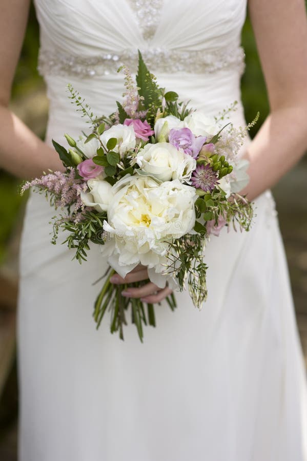 Bride with flowers stock image. Image of bouquet, bunch - 24776109
